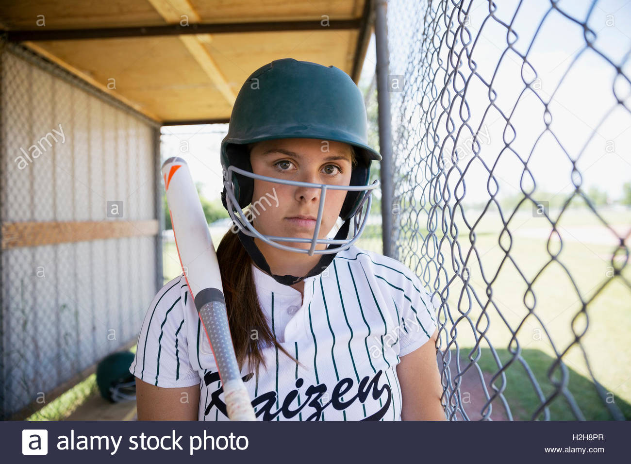 Baseball player wearing batting helmet hi-res stock photography and ...