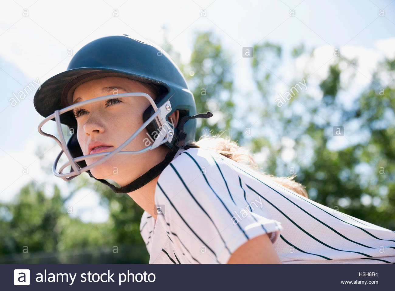 Baseball player wearing batting helmet hi-res stock photography and ...