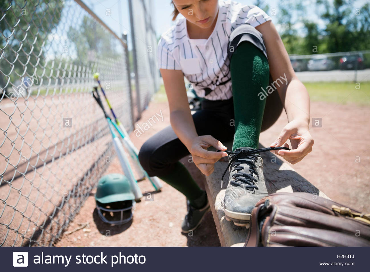 Girl holding softball bat glove hi-res stock photography and images - Alamy