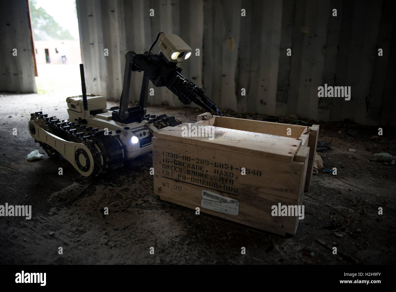 A remote-controlled Micro Tactical Ground Robot uses a camera to reveal ...