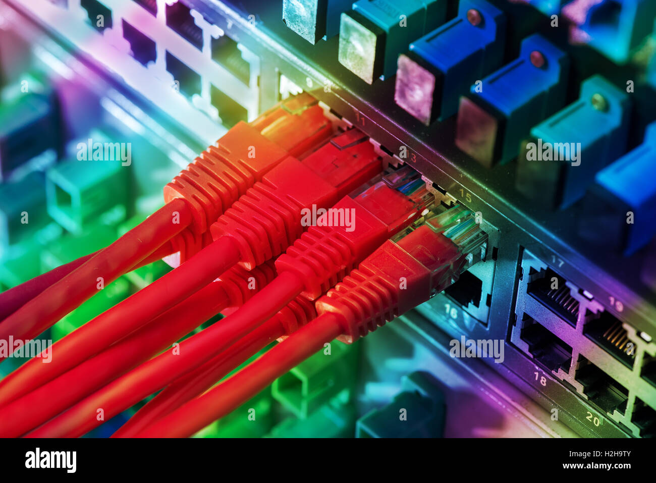 network cables and hub closeup with fiber optical background Stock ...