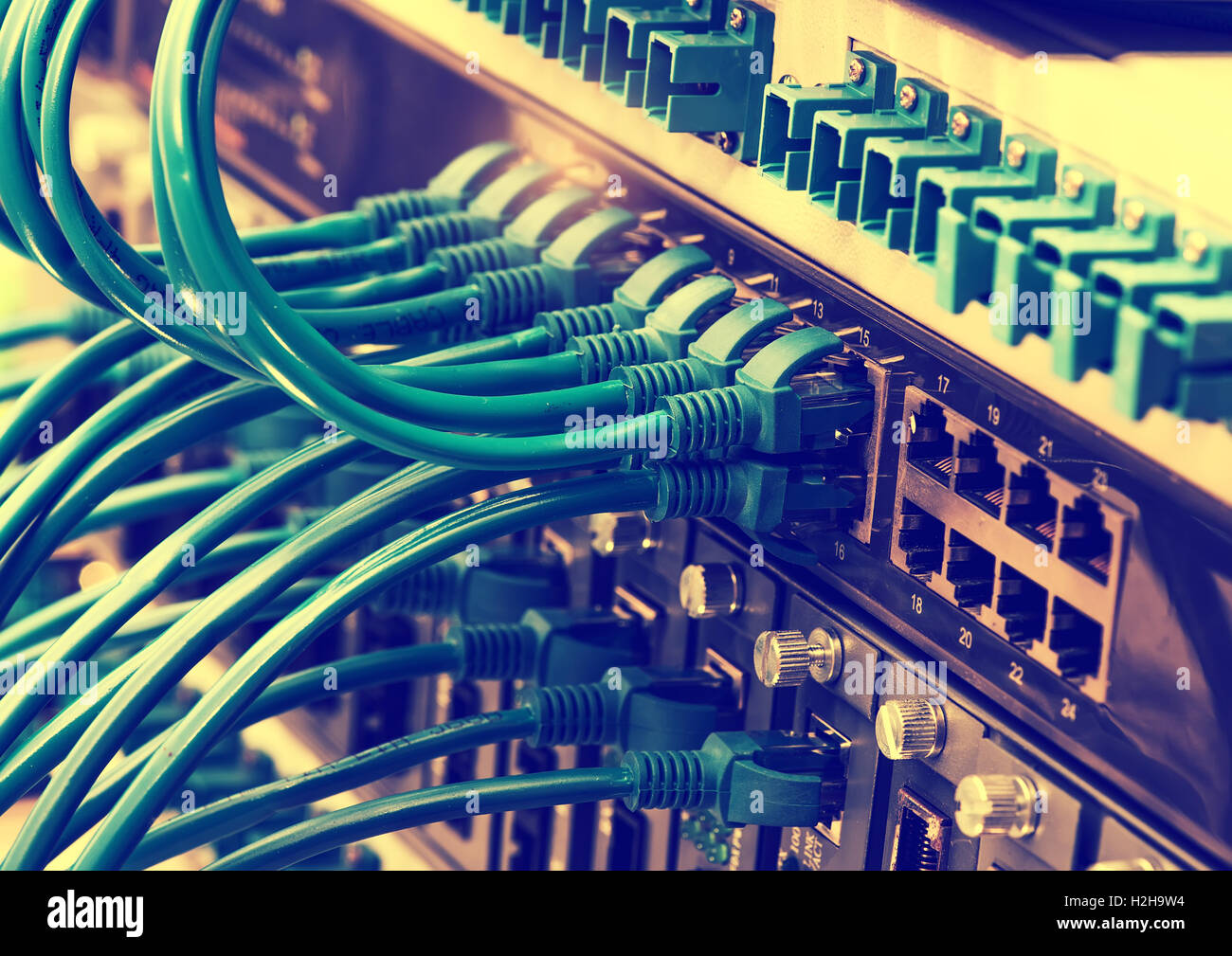 network cables and hub closeup with fiber optical background Stock ...