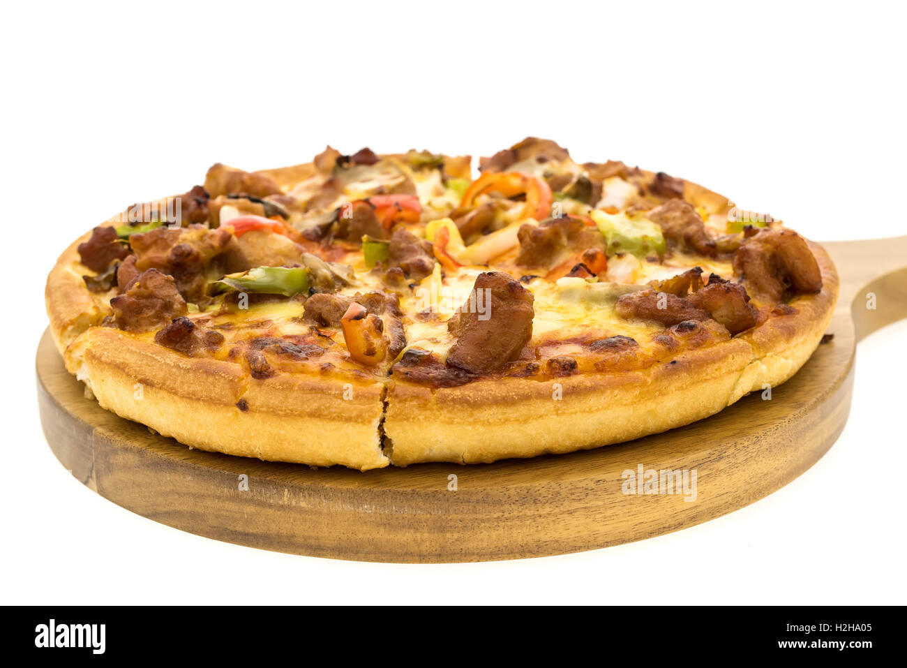 Pizza shot in the pizza wooden pan Stock Photo - Alamy