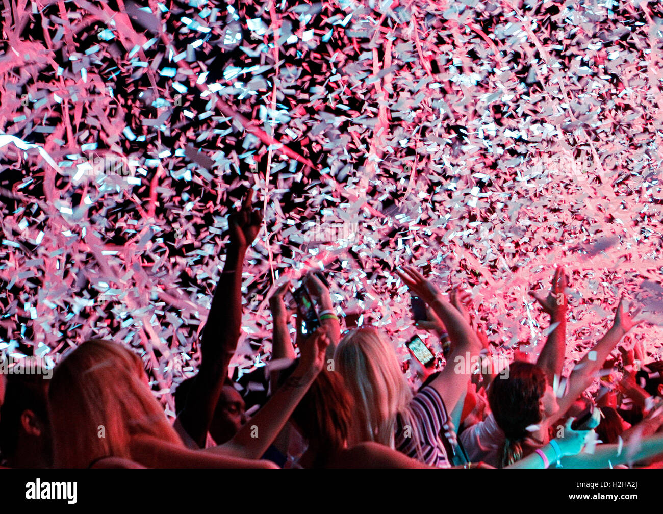 People enjoy a concert during a summer night Stock Photo - Alamy