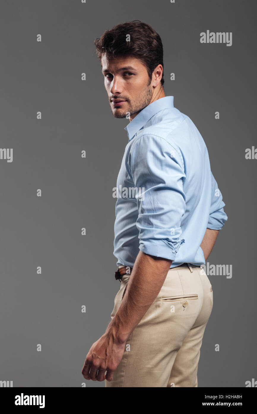 Man standing side view isolated hi-res stock photography and images - Alamy