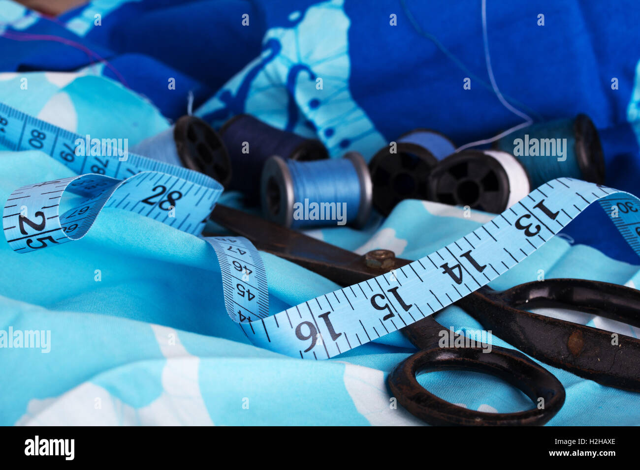 Various sewing equipment in shades of blue Stock Photo - Alamy