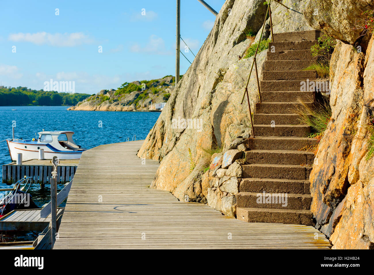 Concrete steps leading up the cliff side from a coastal promenade Stock ...