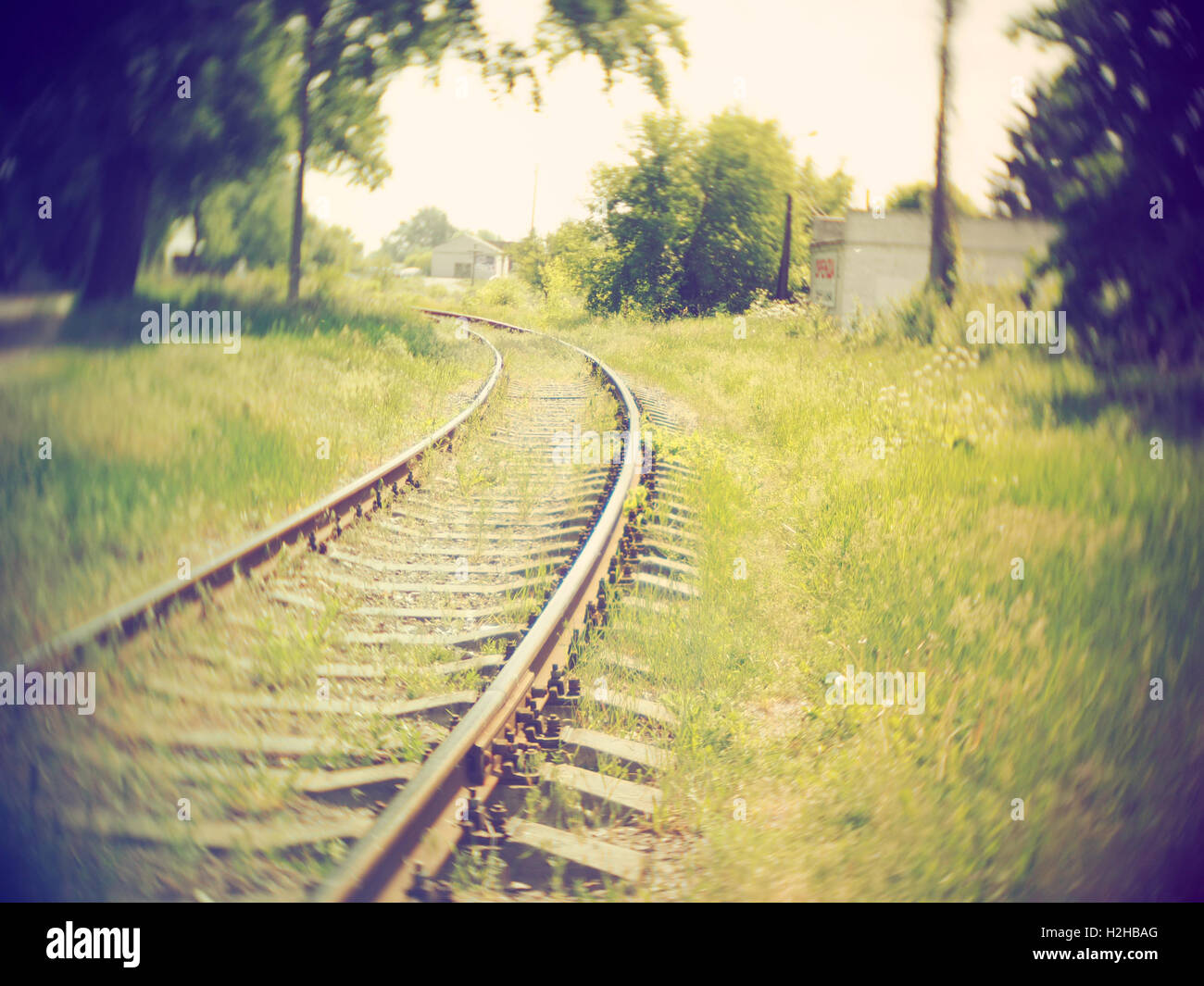 Train railroad disappearing in the distance. Soft focus. Retro style ...