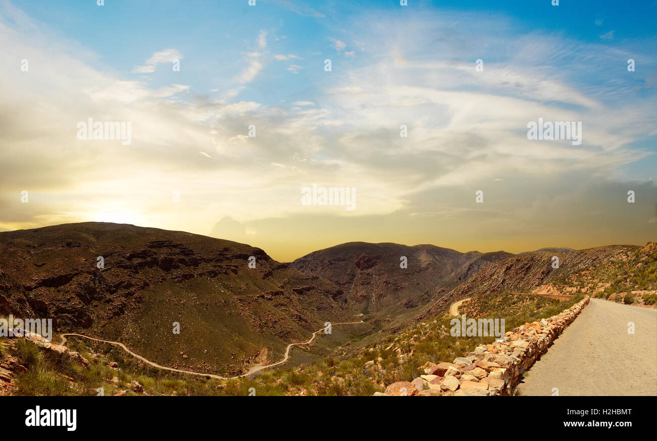 Panoramic view of the Swartberg Pass at sunset. It is the most ...