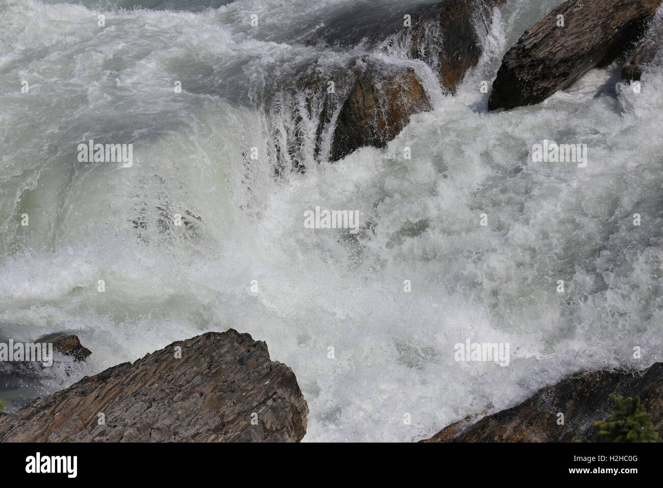 whitewater between rocks Stock Photo - Alamy