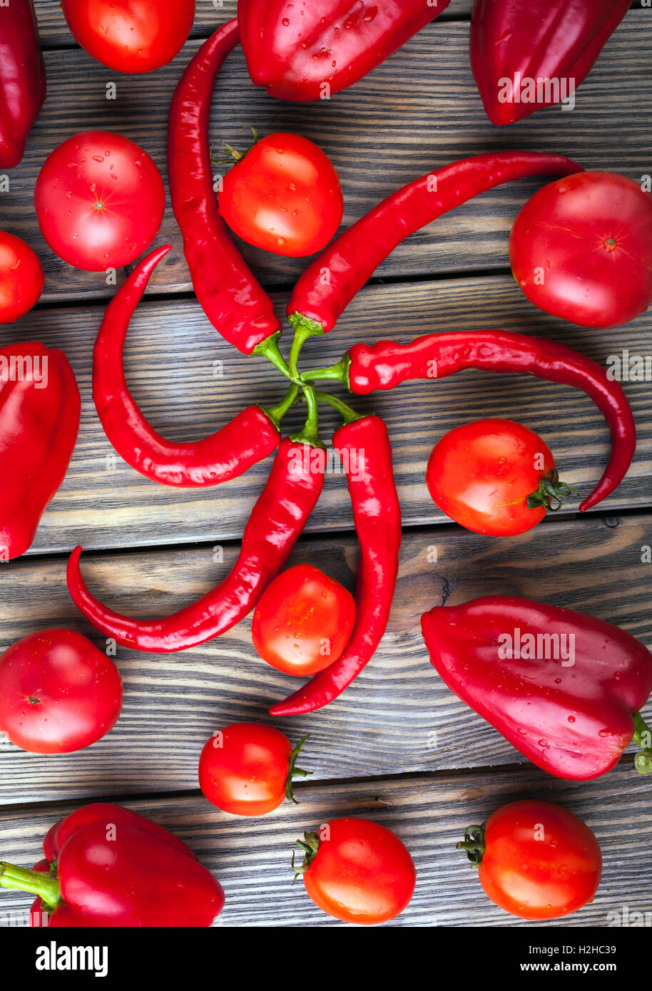 The set of red vegetables on wooden table Stock Photo - Alamy