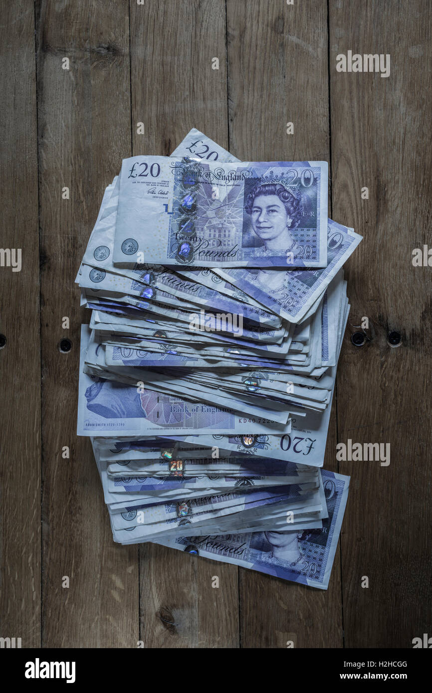 Pile of twenty pound notes Stock Photo - Alamy