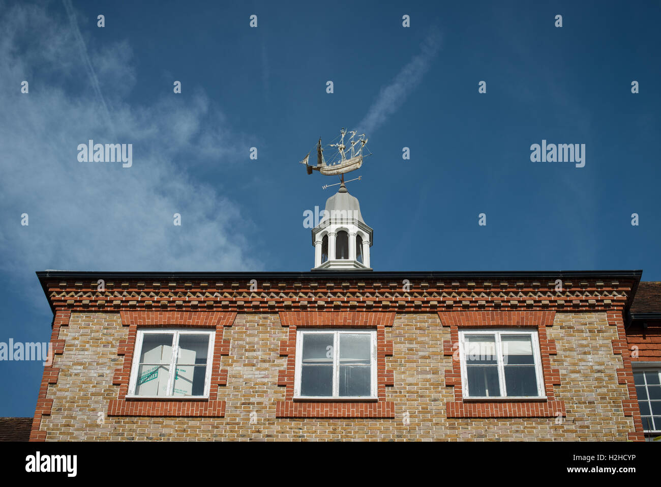 A ship weathervane on the top of a shop in the Lion And Lamb Yard in ...