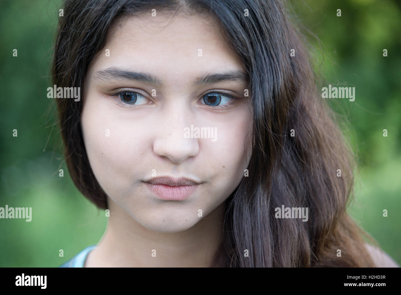 Portrait of beautiful girl looking to the side Stock Photo - Alamy