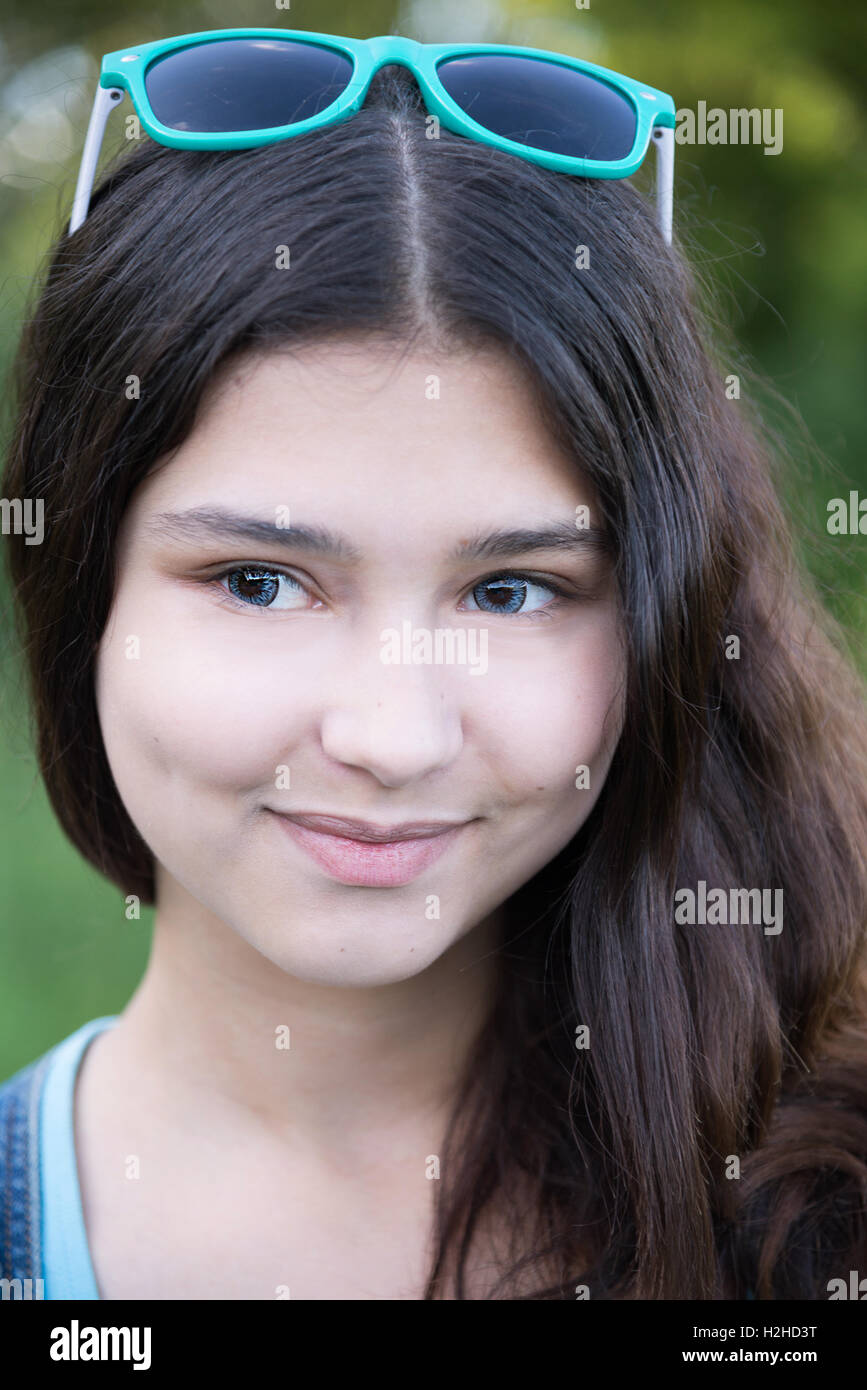 Portrait of beautiful girl looking to the side Stock Photo - Alamy