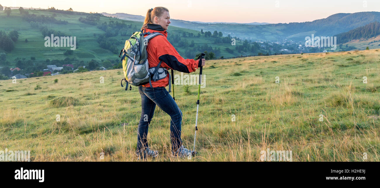 Tourist with backpack Stock Photo - Alamy