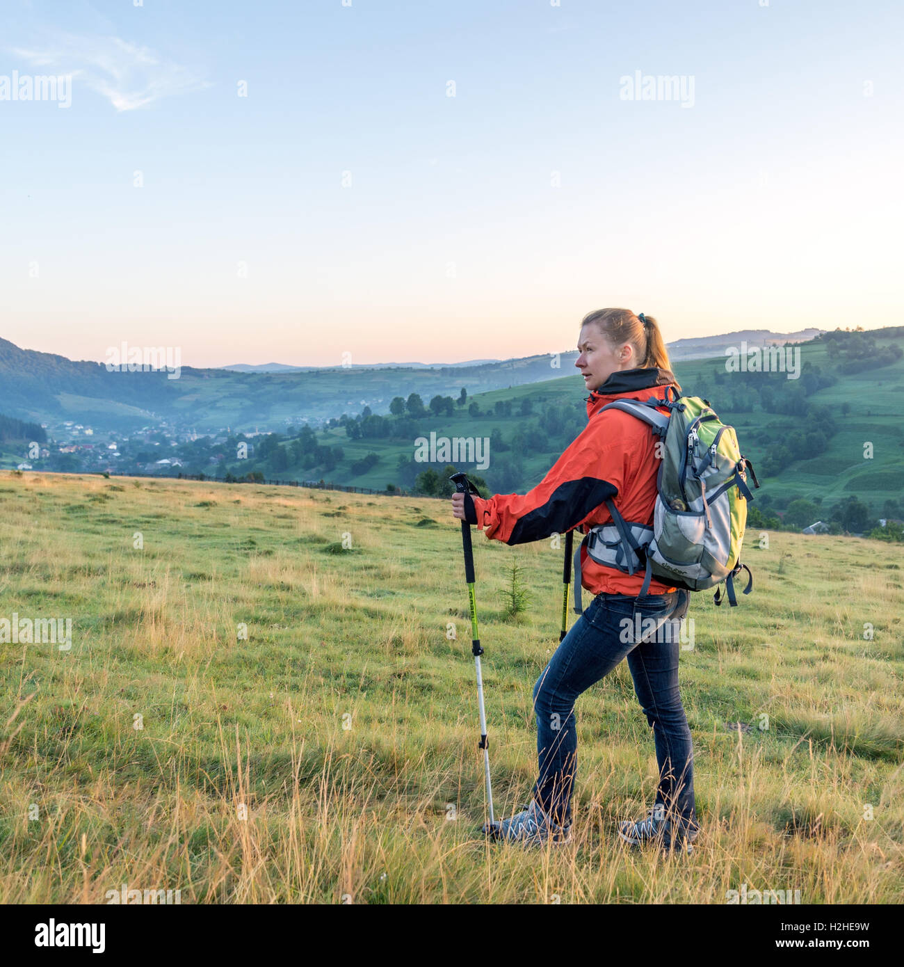 Tourist with backpack Stock Photo - Alamy