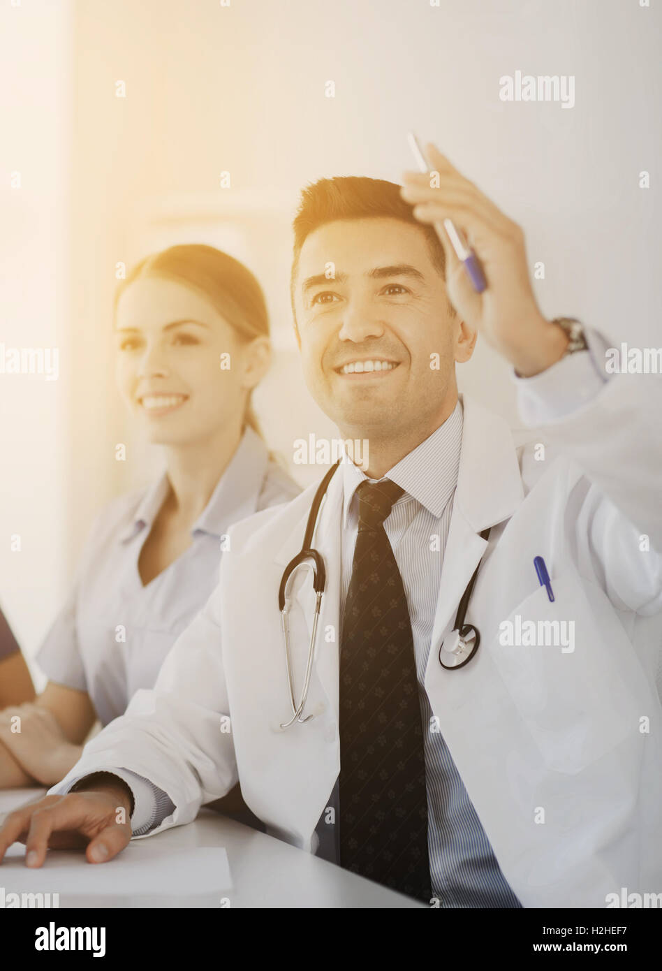 group of happy doctors on conference at hospital Stock Photo - Alamy