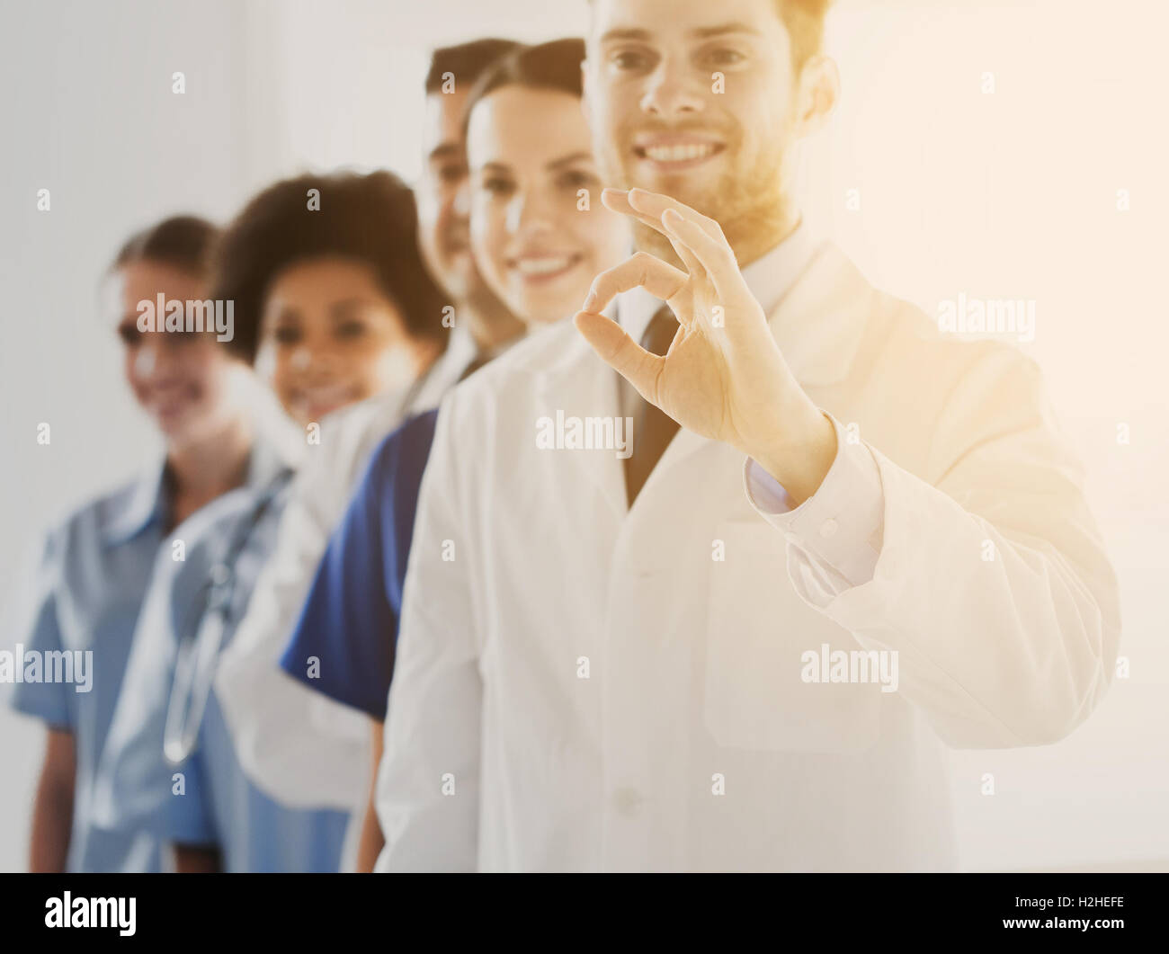 close up of doctors showing ok sign at hospital Stock Photo - Alamy