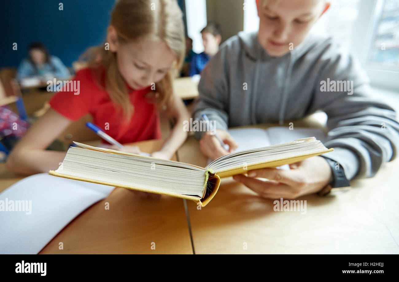 high school students reading book and learning Stock Photo - Alamy