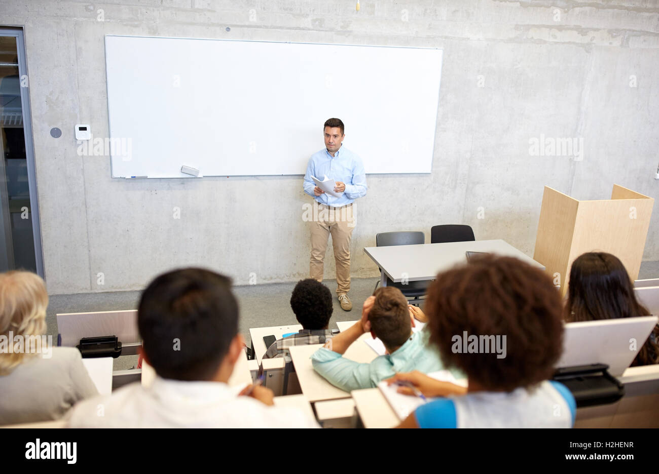 group of students and teacher at lecture Stock Photo - Alamy