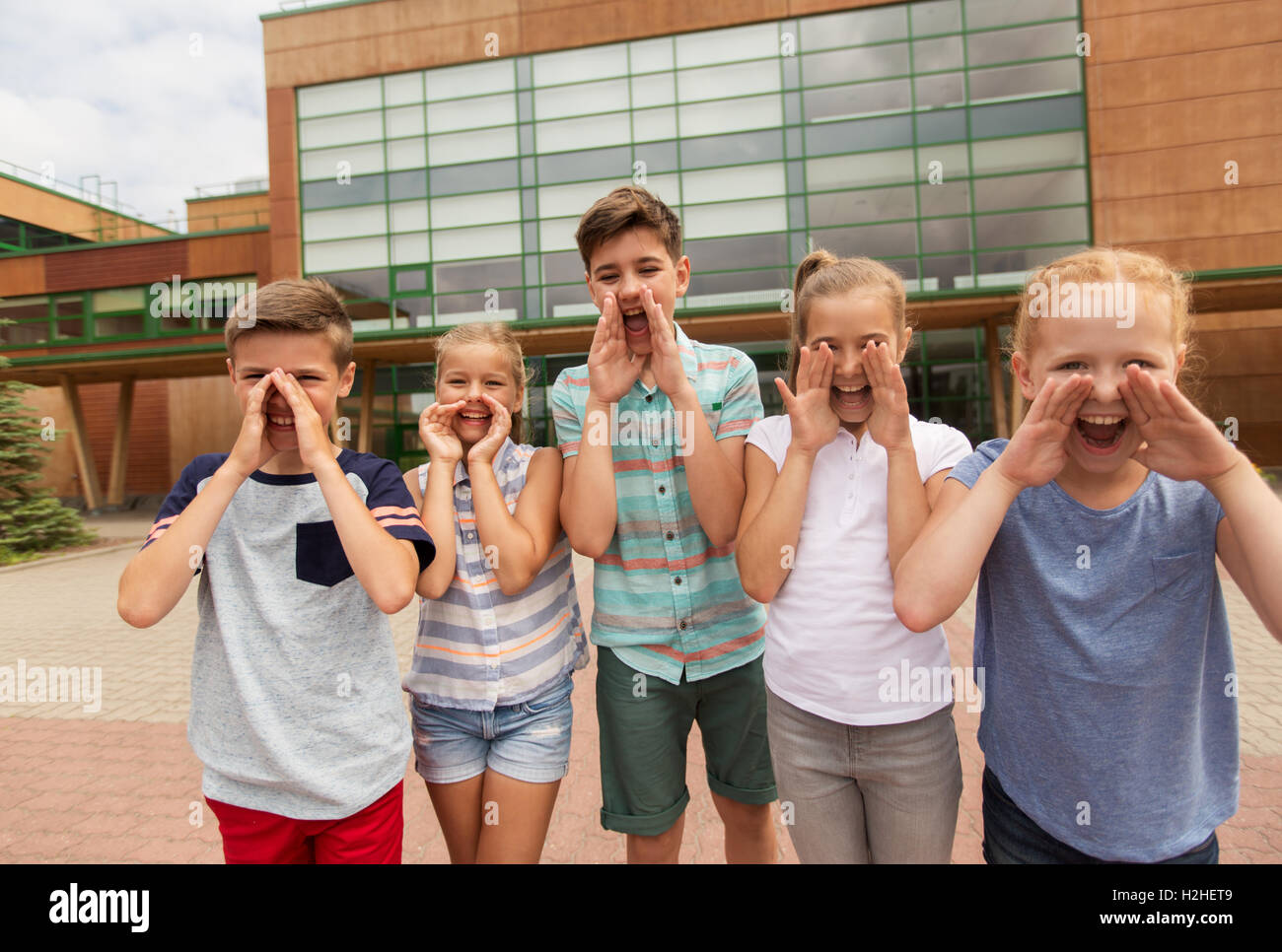 group of happy elementary school students Stock Photo - Alamy