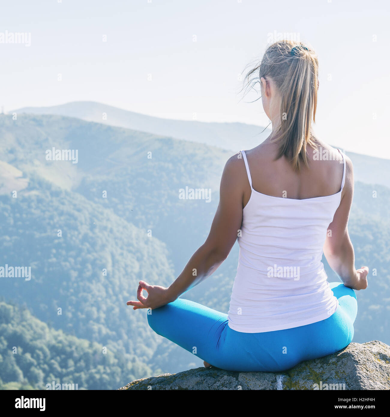 Young woman meditate Stock Photo - Alamy