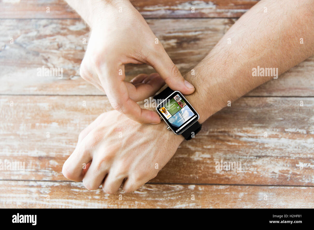 close up of male hands setting smart watch Stock Photo - Alamy
