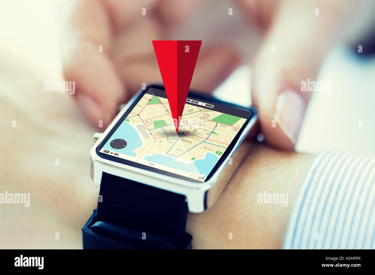 close up of hands with map on smartwatch screen Stock Photo - Alamy