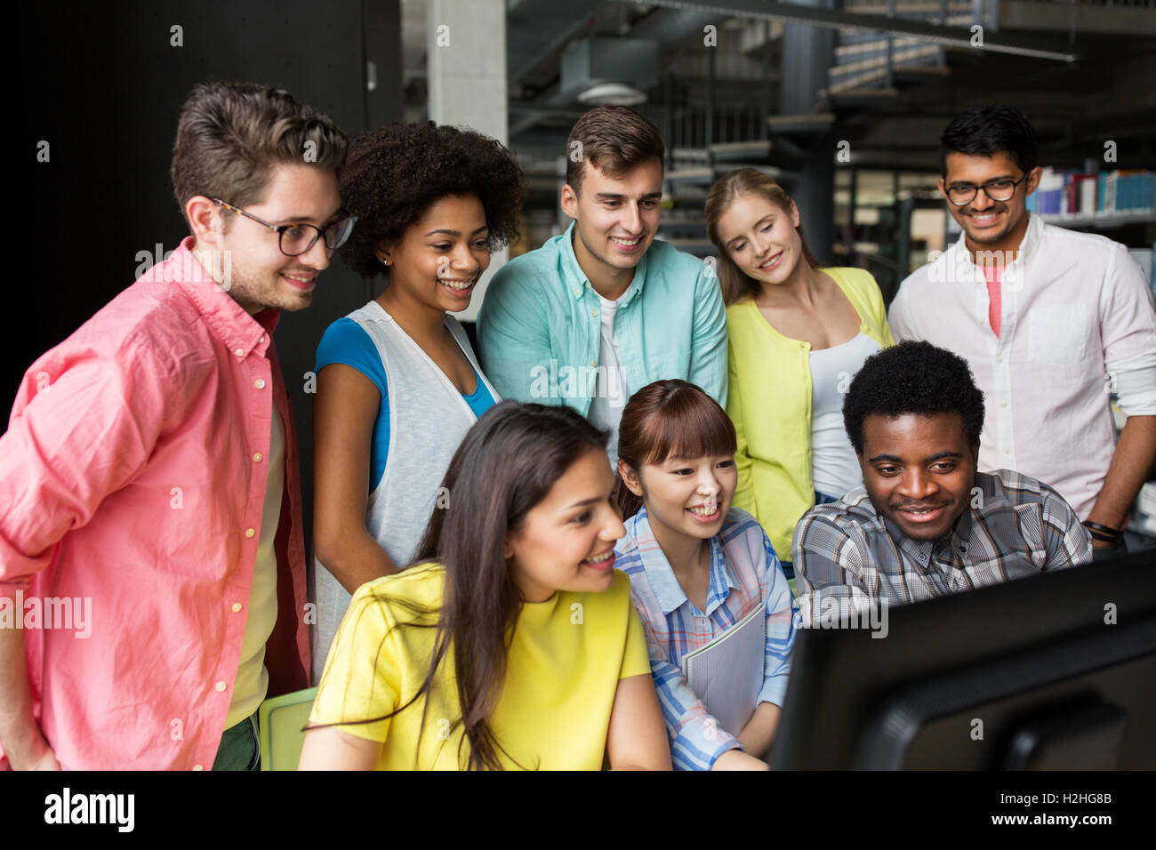 international students with computers at library Stock Photo - Alamy