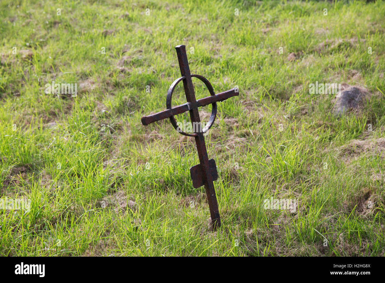 old rusty grave cross on cemetery in ireland Stock Photo - Alamy