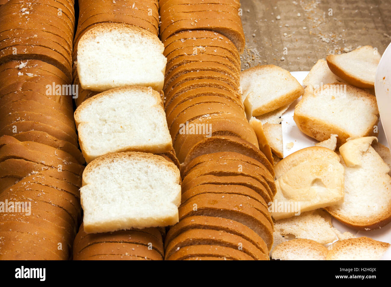 Breads petite white or sandwich placed in box paper. closeup. of a pile ...