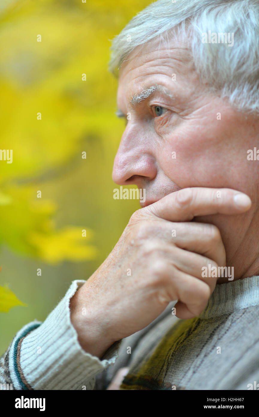 Senior man thinking Stock Photo - Alamy