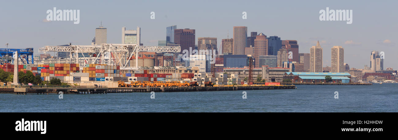 A panoramic photograph of the Boston skyline and dockyards, as seen ...