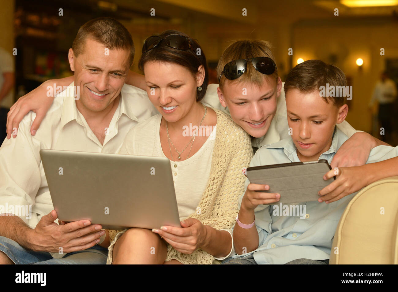 happy family with laptop Stock Photo - Alamy