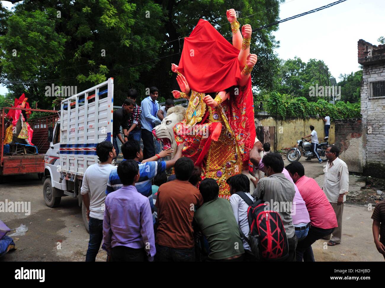 Allahabad, India. 28th Sep, 2016. People carrying Idol of Goddess Durga ...