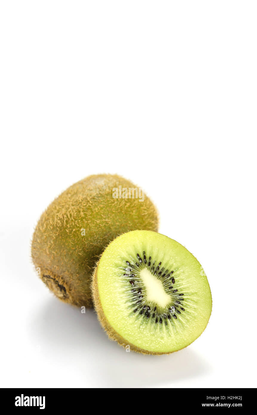 delicious whole kiwi fruit and half on white background Stock Photo - Alamy