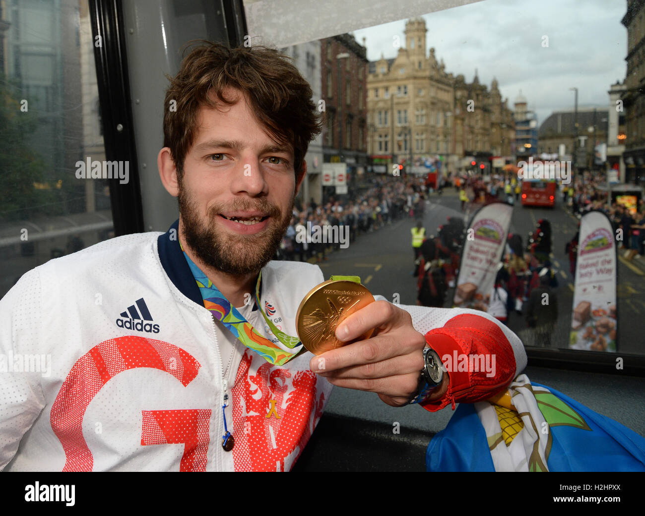 Great Britain's Tom Ransley celebrates during the homecoming event in ...