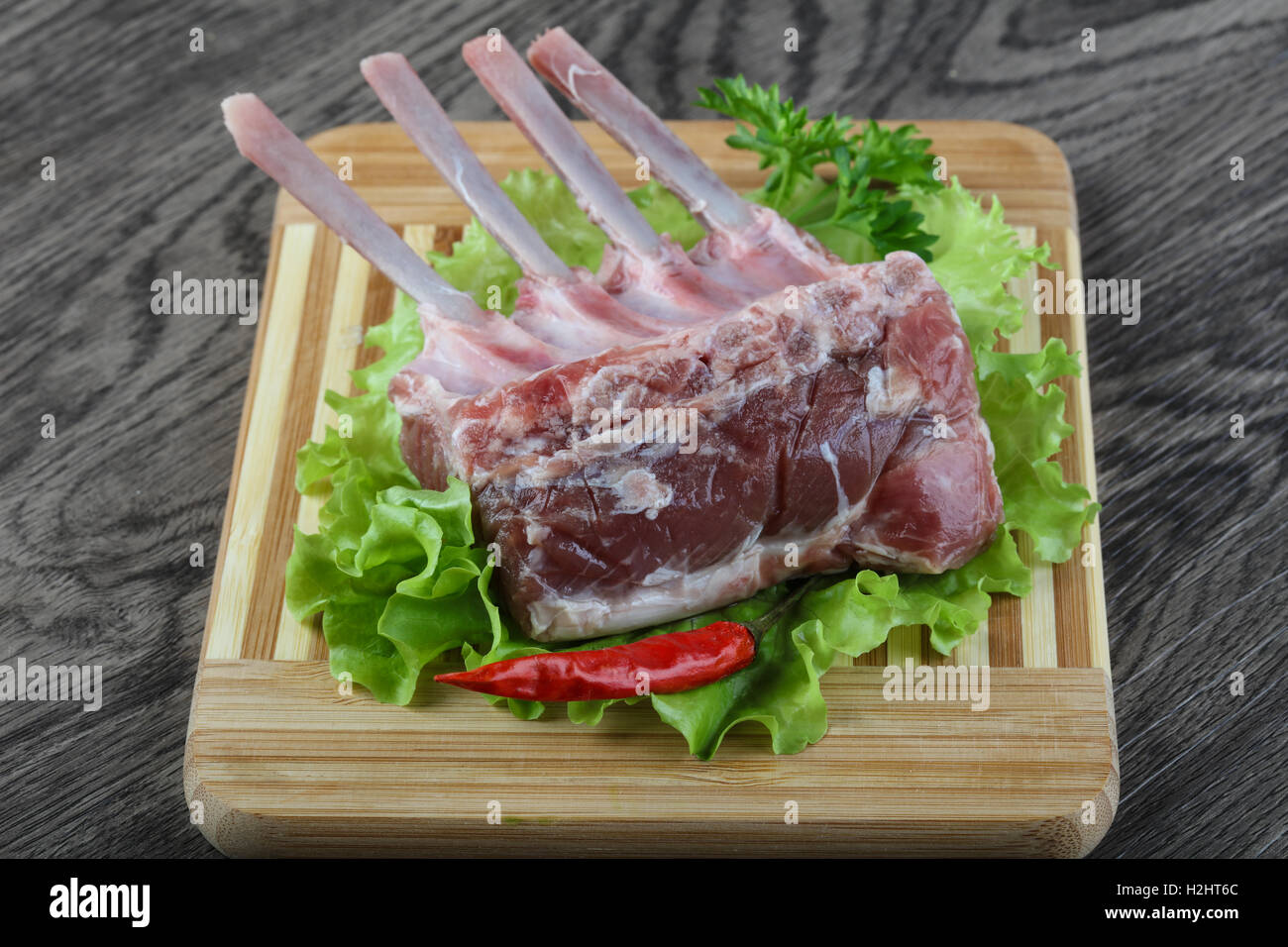 Lamb Frenched Rack 4 rib bone Stock Photo - Alamy