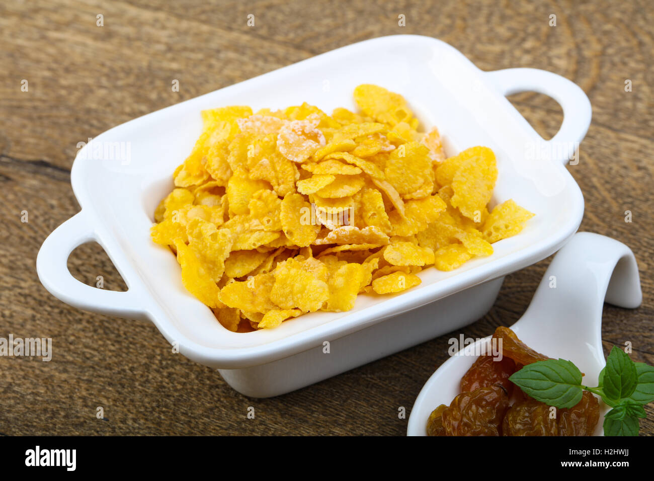 Corn flakes with raisin - dietary fitness breakfast Stock Photo - Alamy