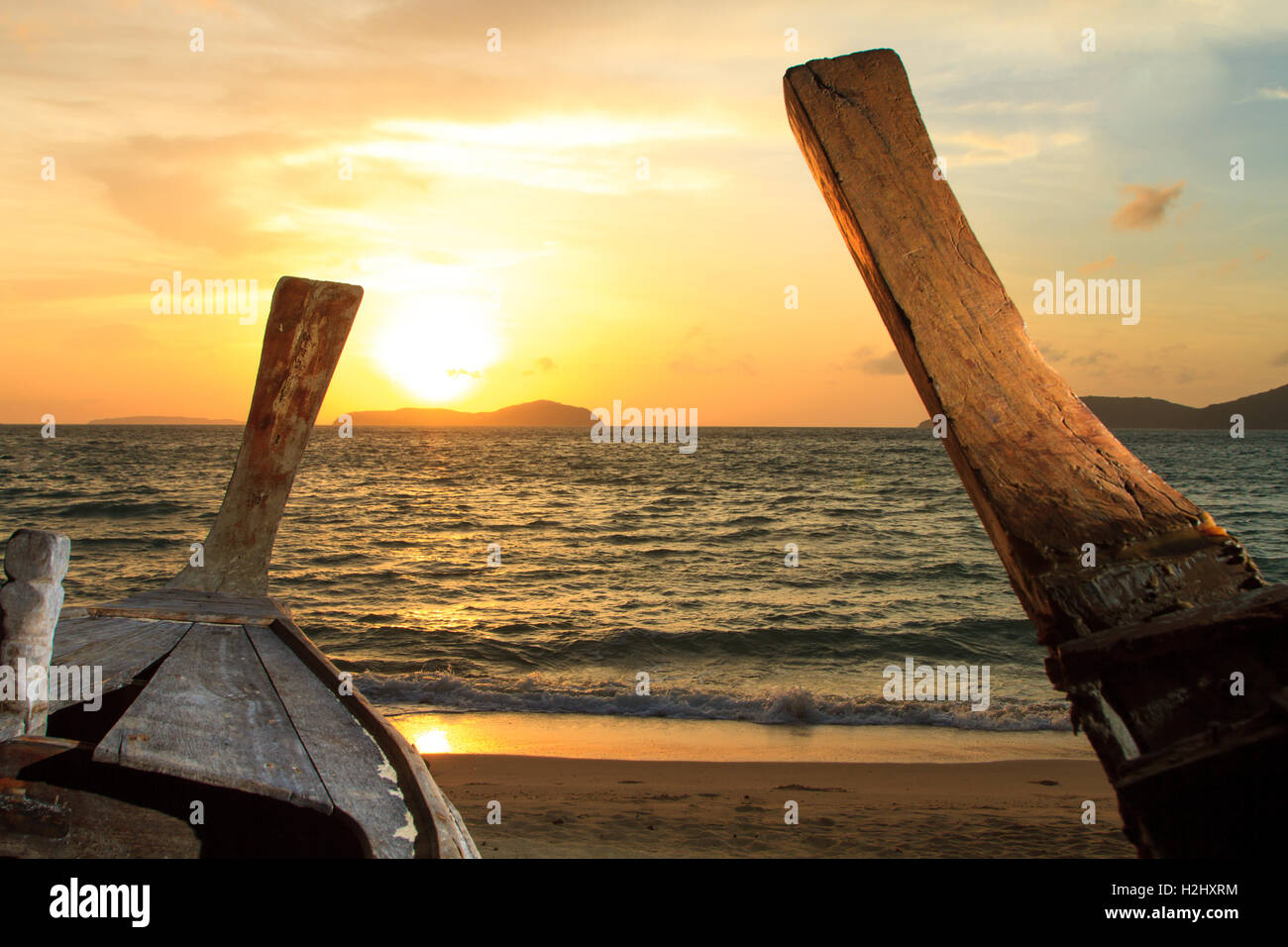 Beautiful sunrise in Rawai Phuket island Thailand with Long tailed boat ...