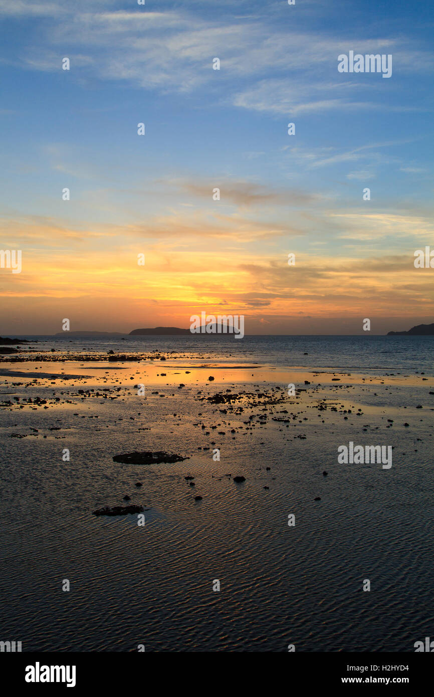 Beautiful sunrise in Rawai Phuket island Thailand with Long tailed boat ...