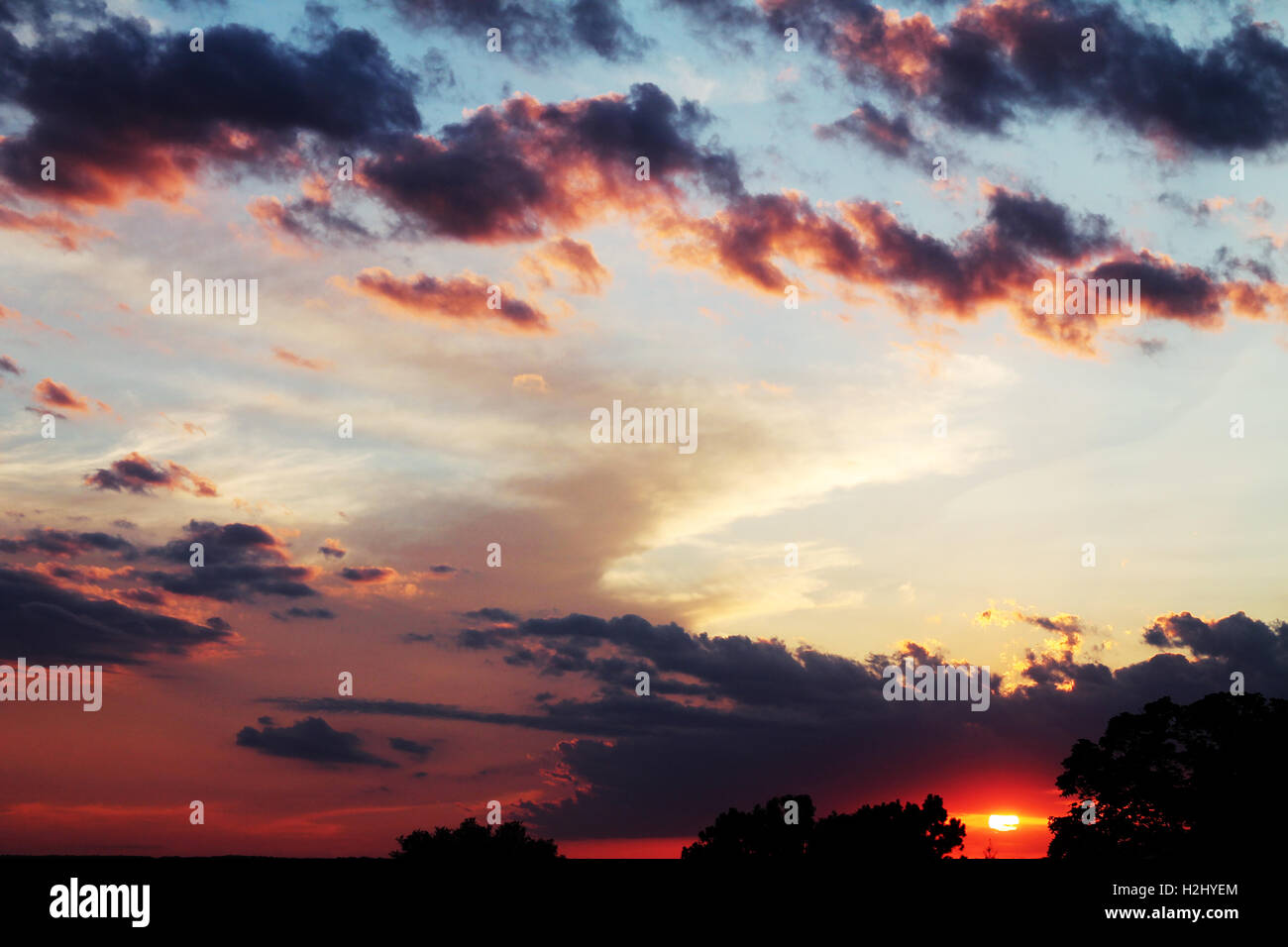 Clouds during the sunset Stock Photo - Alamy