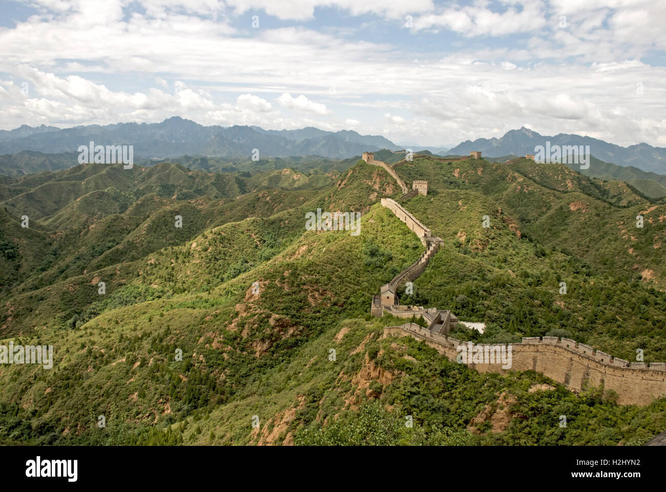 The Great Wall of China meanders over the mountains like a giant snake ...