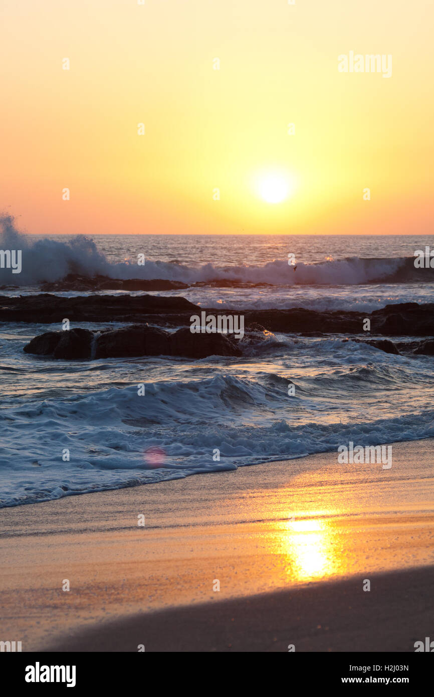 sunset on beach Stock Photo - Alamy