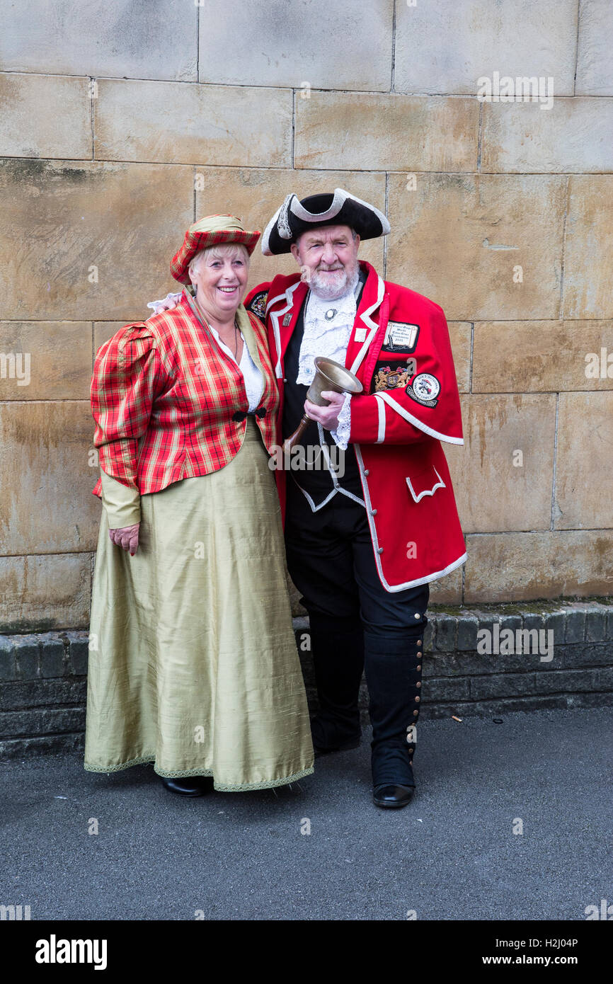 A Town Crier and his lady attending the annual Town Crier competition ...