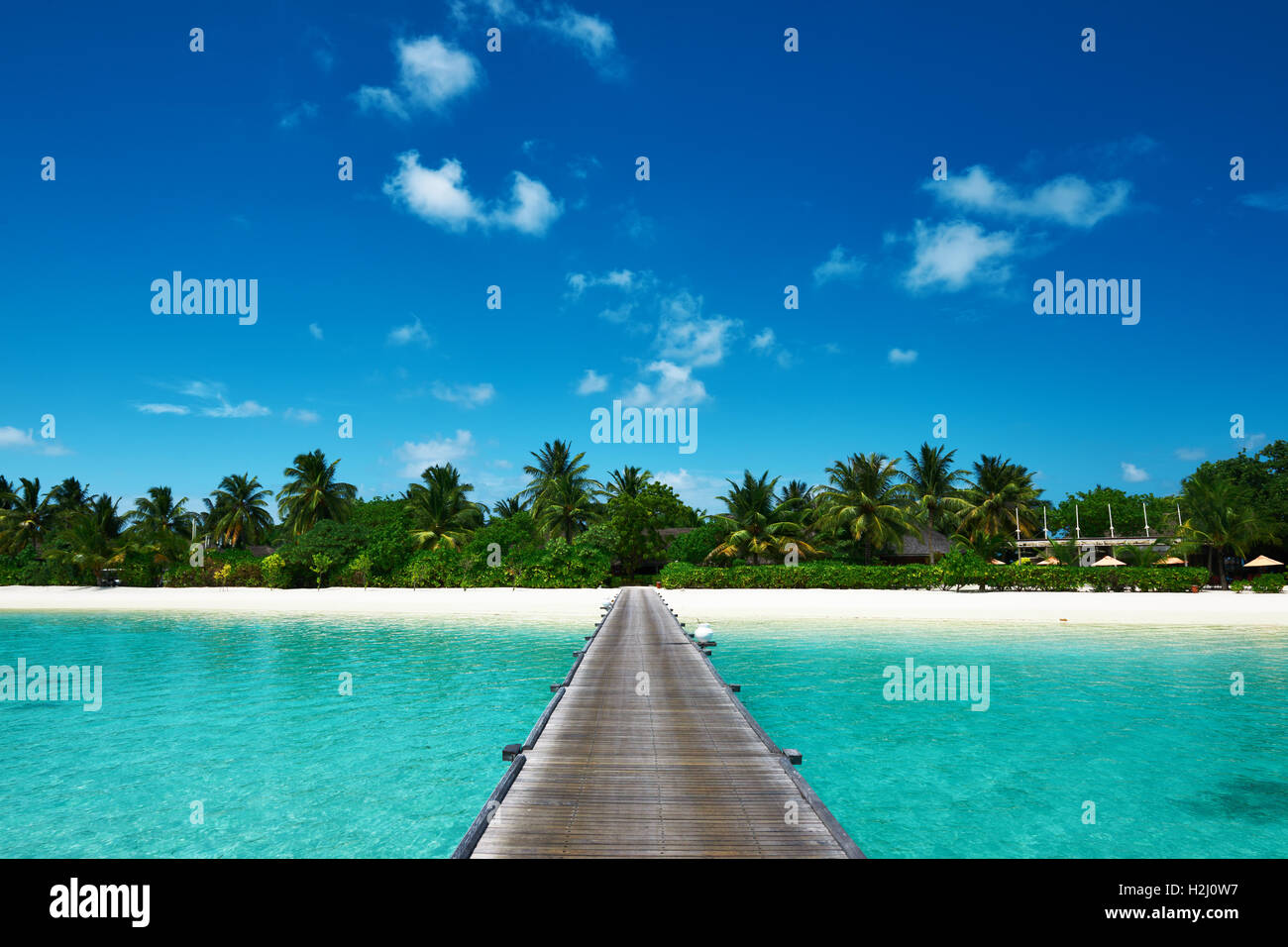 Beautiful beach with jetty Stock Photo - Alamy