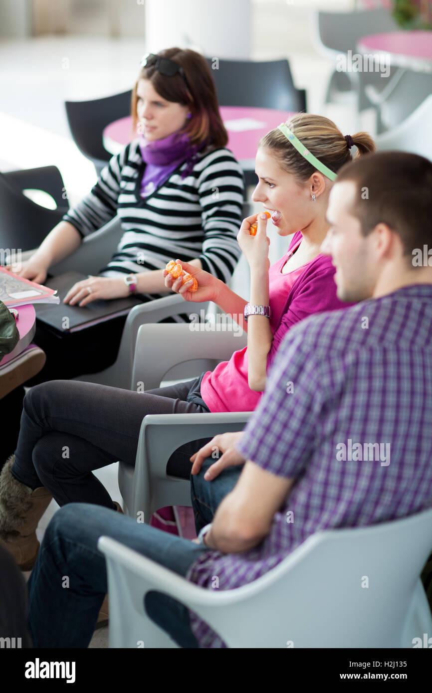 Group of college/university students during a brake Stock Photo - Alamy