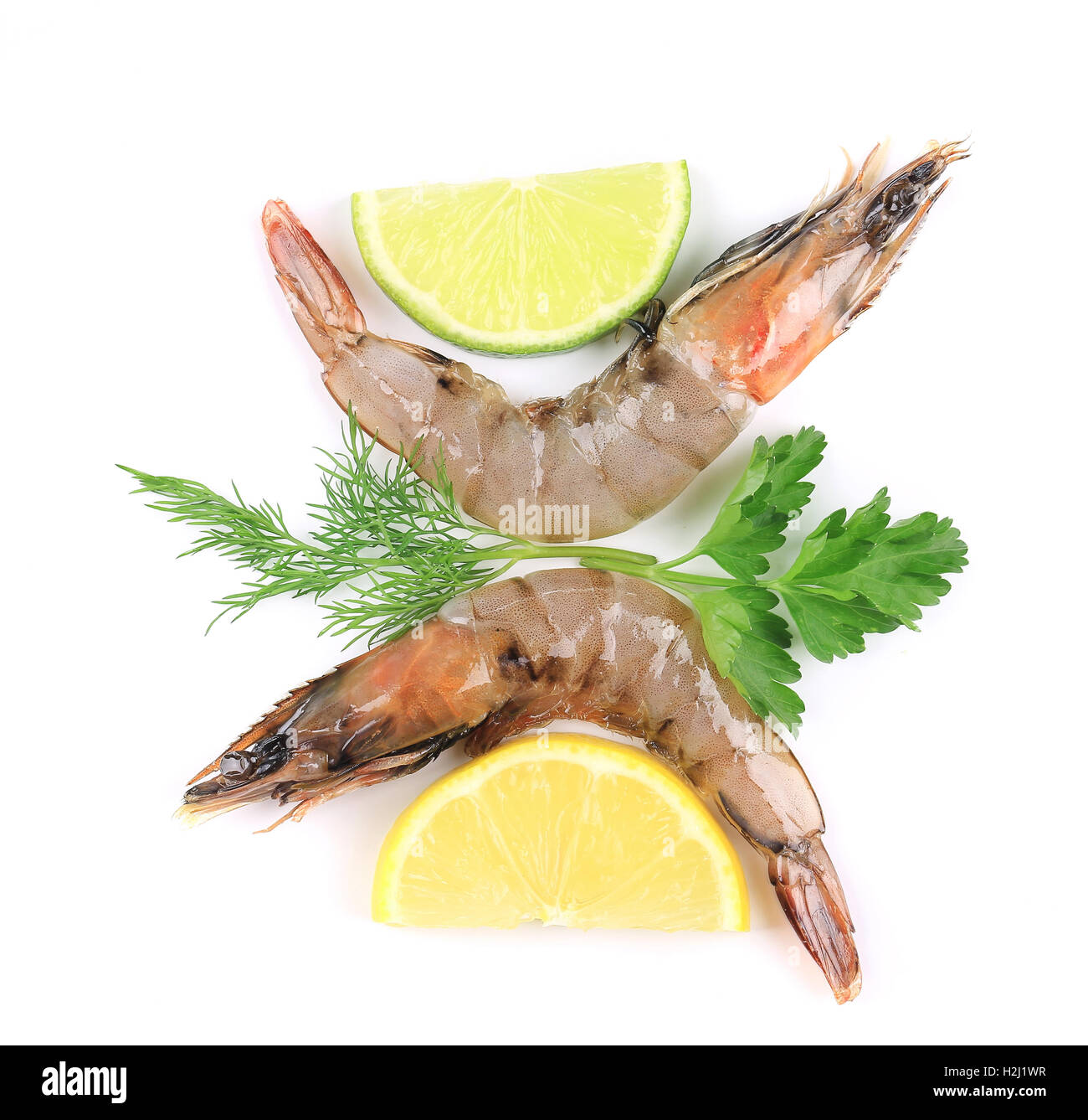 Two shrimps with lemon lime and parsley dill Stock Photo - Alamy