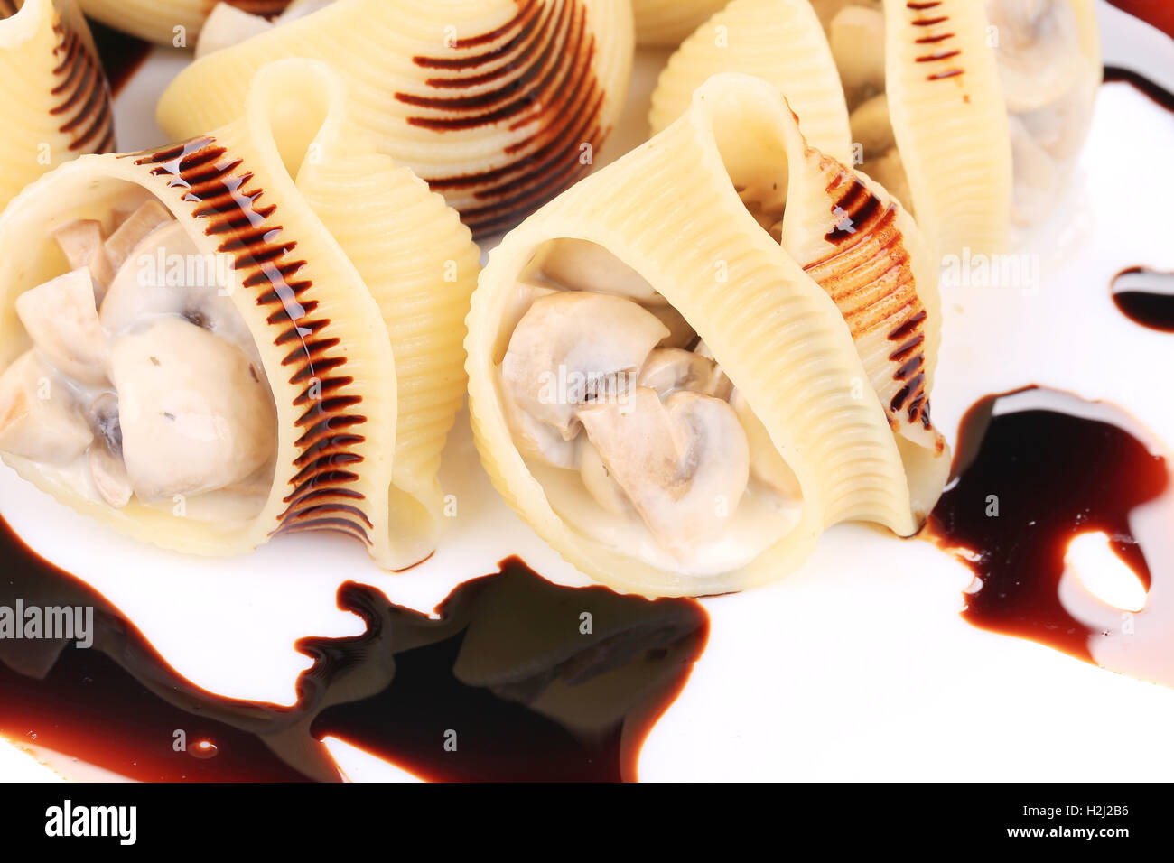 pasta shells stuffed with mushrooms Stock Photo - Alamy
